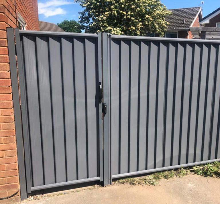 Grey Metal Fence with Flat Caps | ColourFence