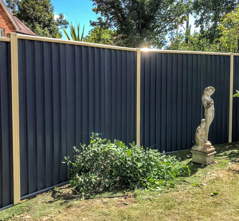 Blue Fence With Flat Caps & Cream Posts | ColourFence