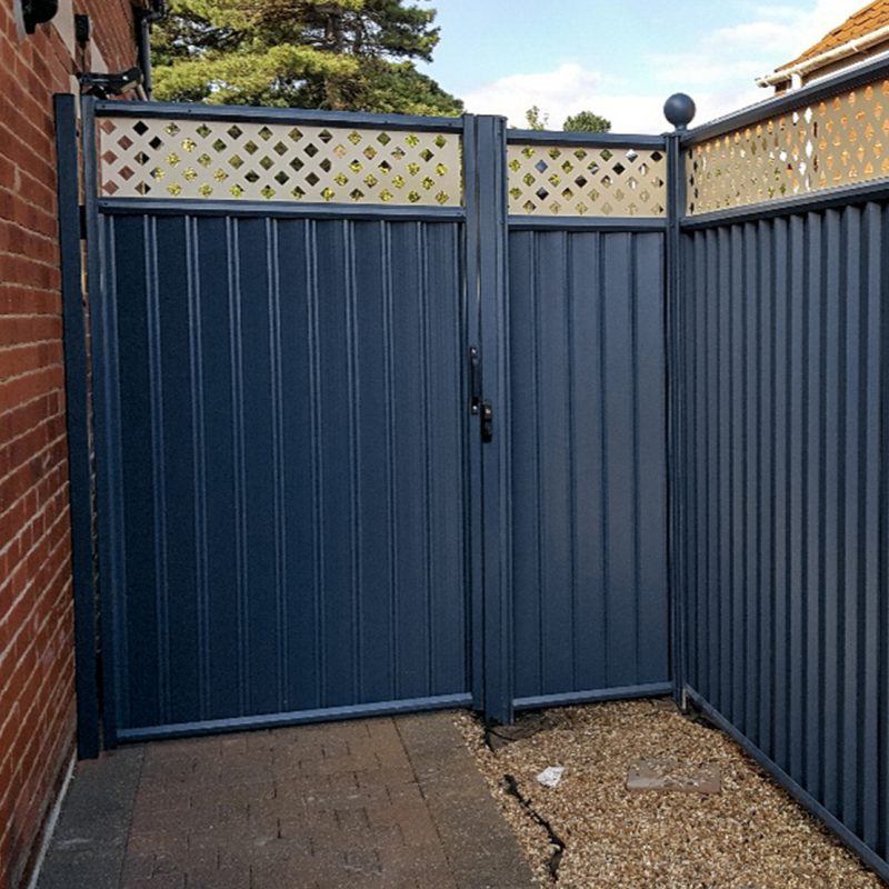 Blue Metal Fence with Cream Trellis & Ball Caps | ColourFence