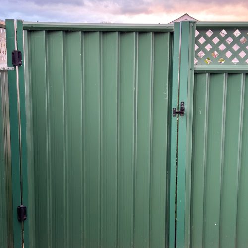 Green Metal Fence with Cream Trellis & Ball Caps | ColourFence